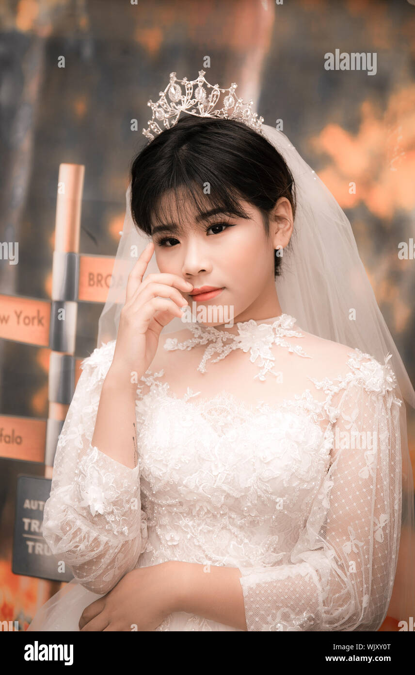 Beautiful girl single bride alone sad Stock Photo - Alamy