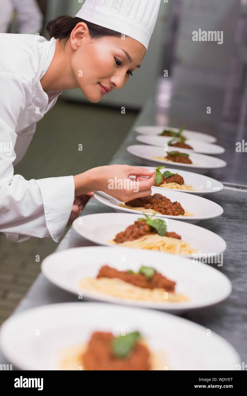 Chef basil leaf spaghetti dish hi-res stock photography and images - Alamy