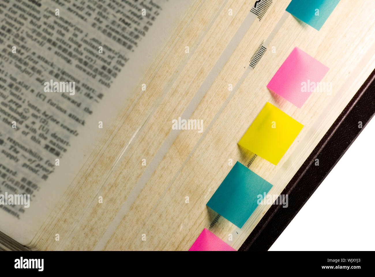 Here are a lot of tags on book pages with white background Stock Photo ...