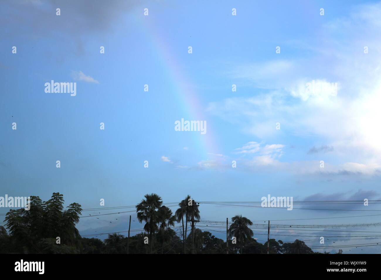 A Very Soft Rainbow Appears On The Sky, Beautiful Natural View After ...