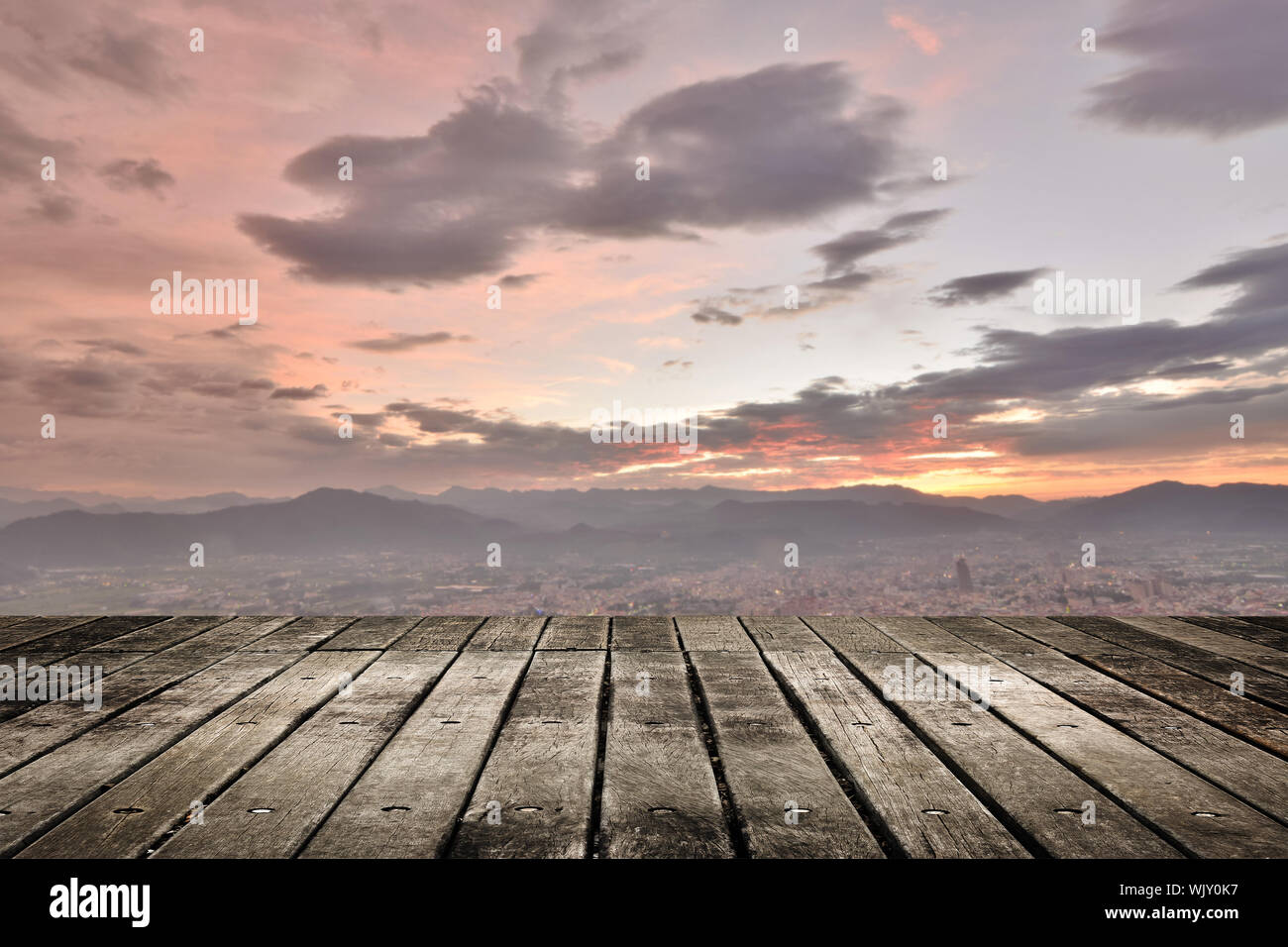 City sunset with wooden ground Stock Photo - Alamy