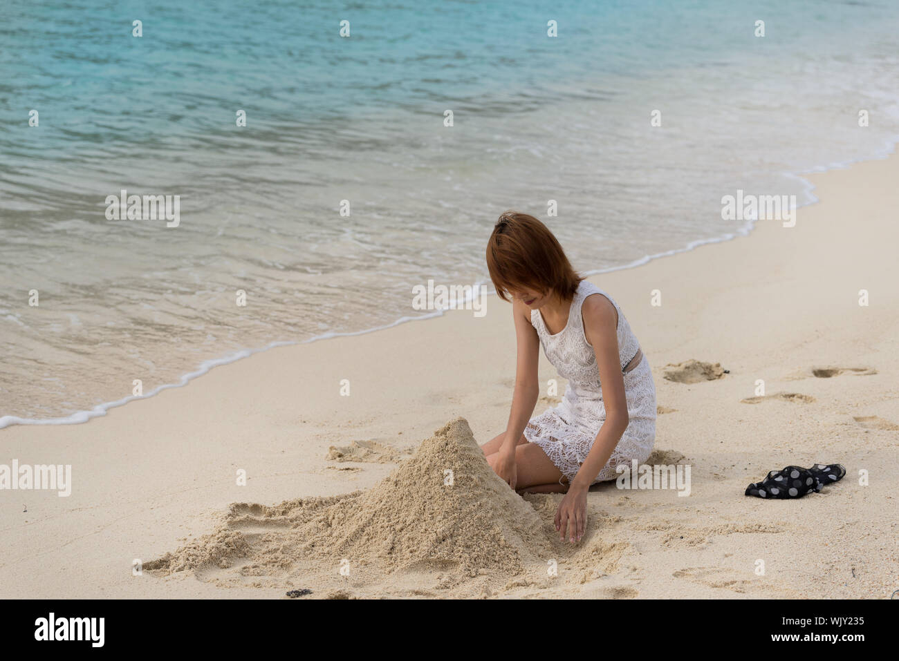 Making sandcastle hi-res stock photography and images - Alamy