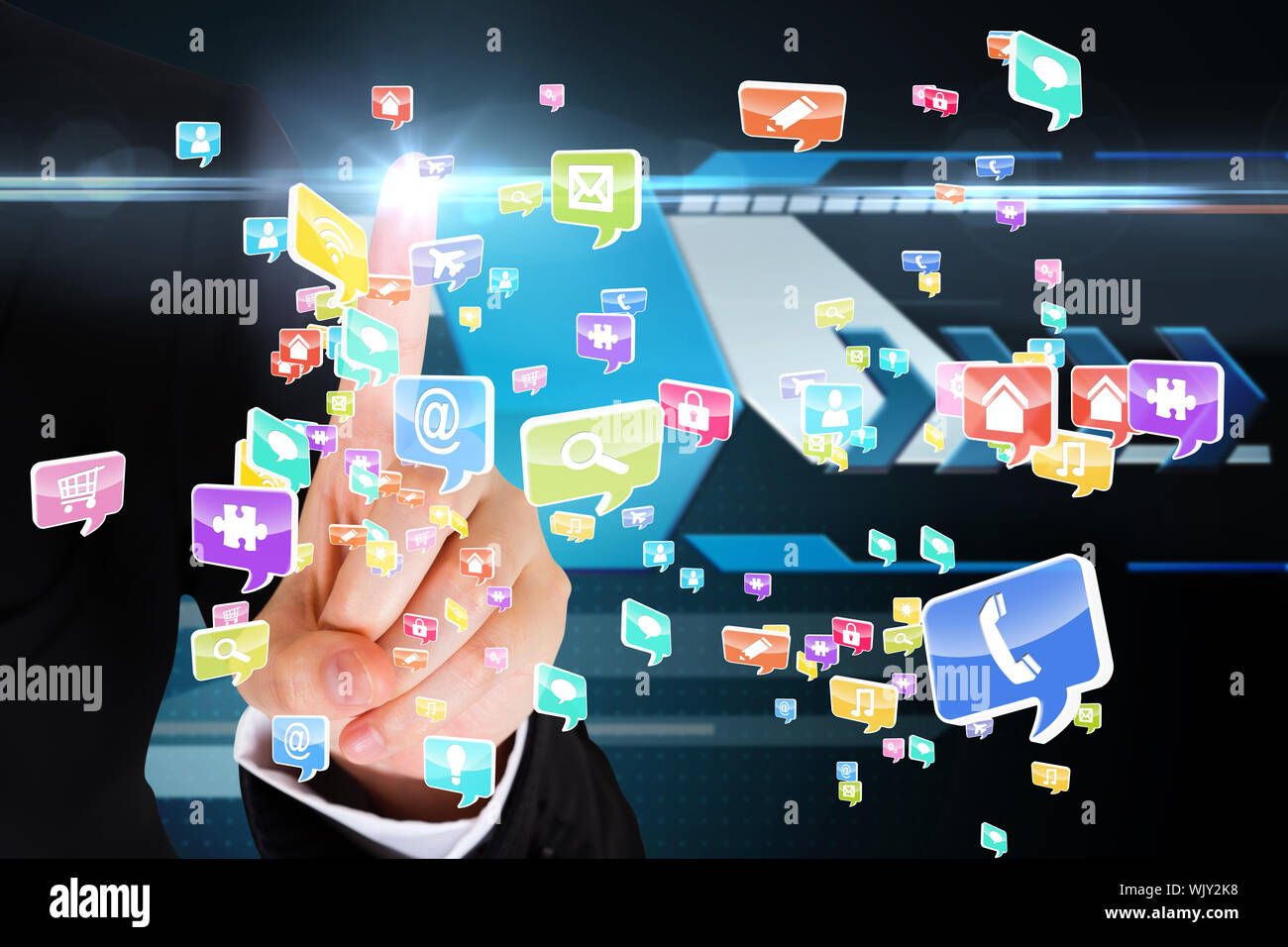 Digital composite of finger pointing to app icons Stock Photo - Alamy