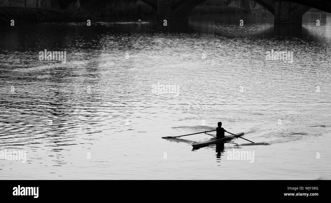 Men In Rowing Boat Black and White Stock Photos & Images - Alamy