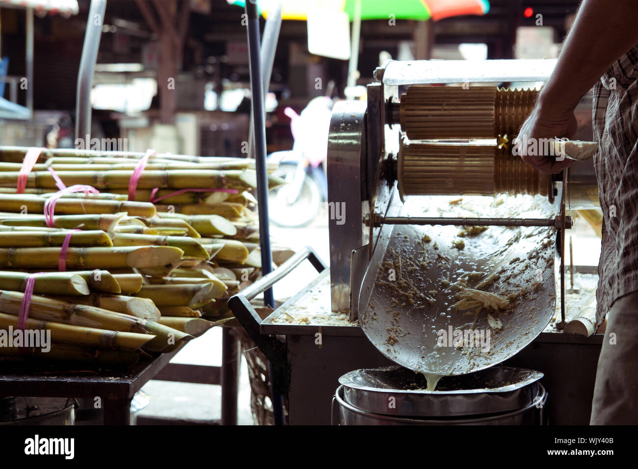 Crushing sugar cane hi-res stock photography and images - Alamy