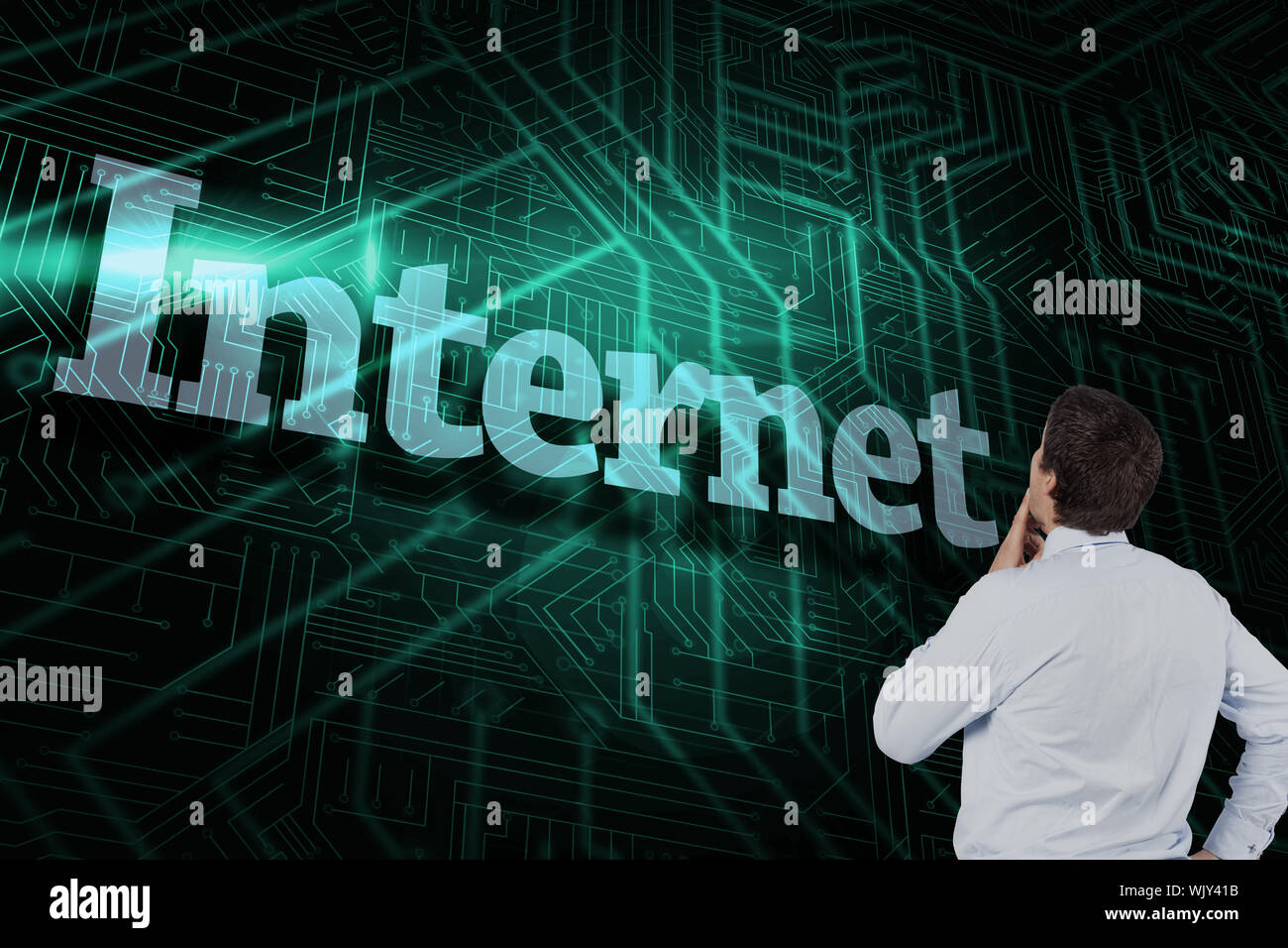 The word internet and thinking businessman touching his chin against ...