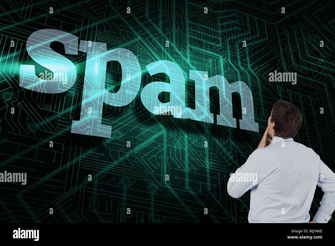 The word spam and thinking businessman touching his chin against green ...