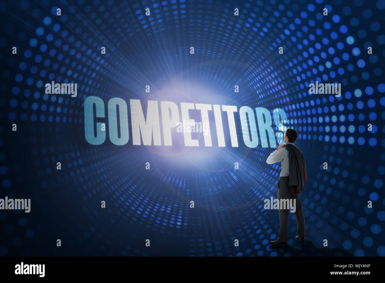 The word competitors and businessman holding his jacket against ...