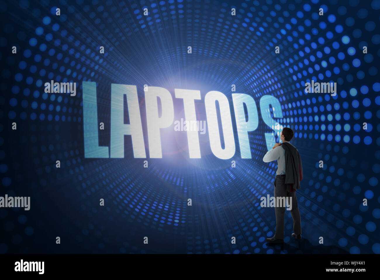 The word laptops and businessman holding his jacket against futuristic ...