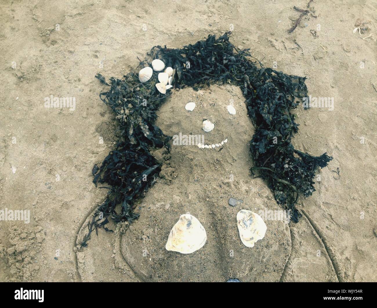 Mermaid sculpture on beach hi-res stock photography and images - Alamy