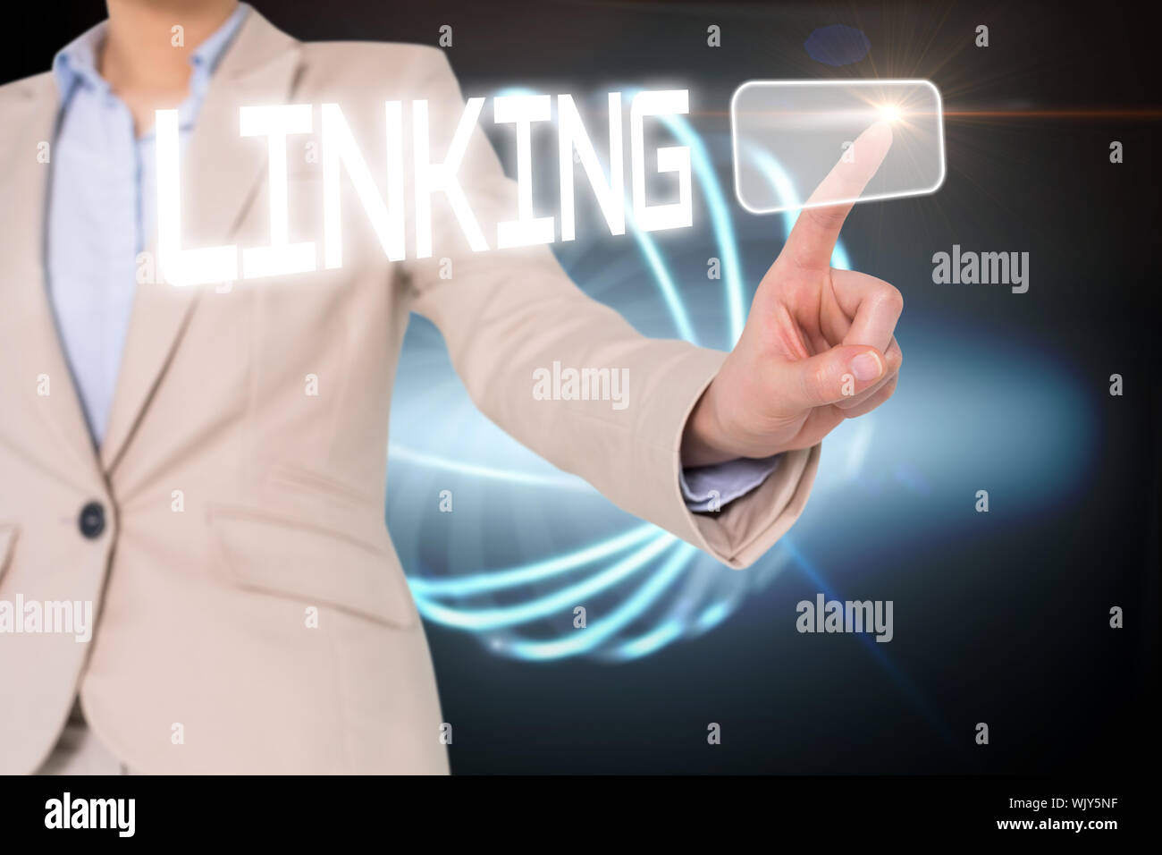 Businesswomans finger touching linking button against black background ...