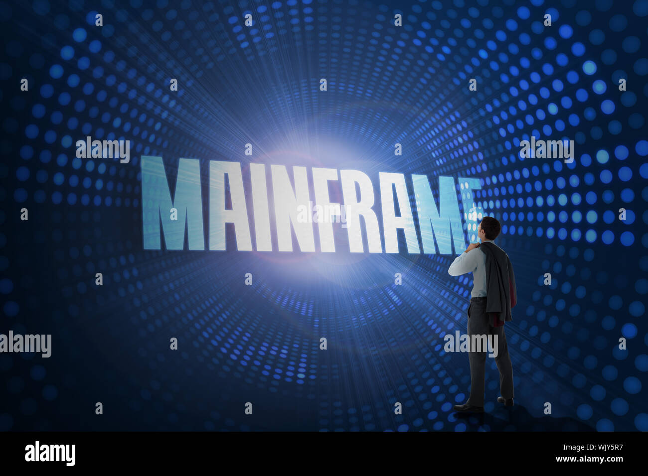 The word mainframe and businessman holding his jacket against ...