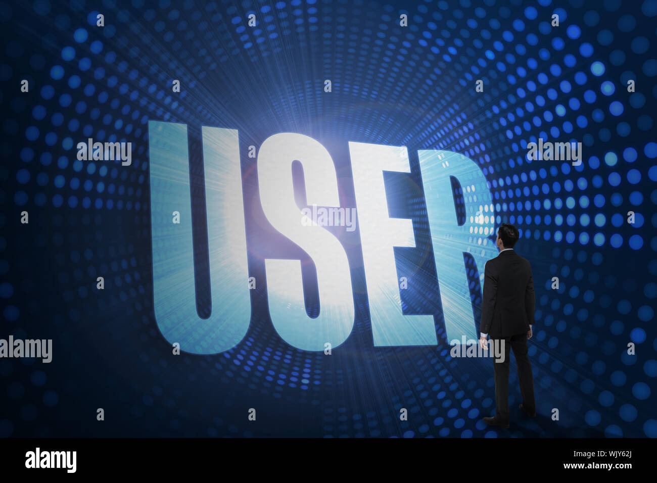 The word user and asian businessman against futuristic dotted blue and ...