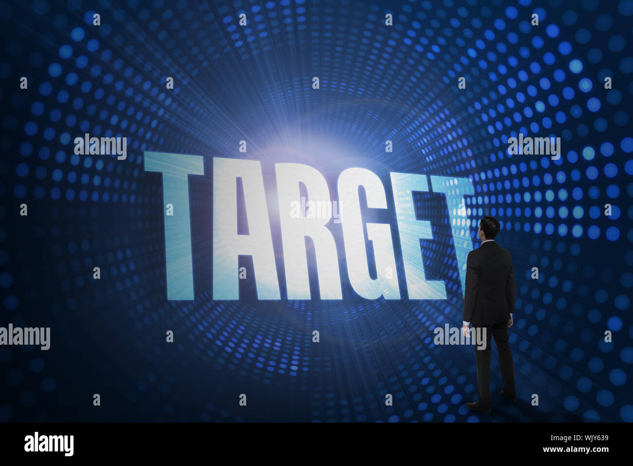 The word target and asian businessman against futuristic dotted blue ...
