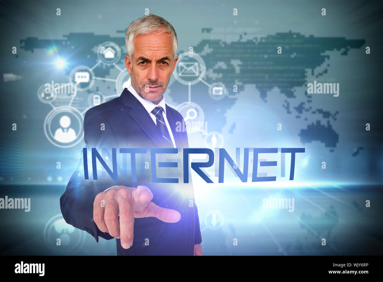 The word internet and businessman pointing against futuristic ...