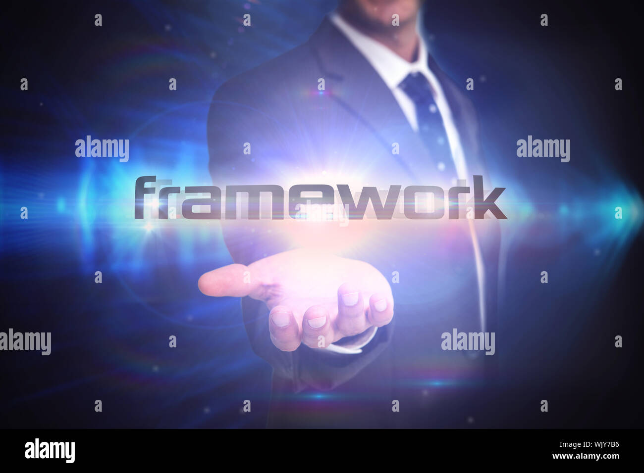 The word framework and businessman presenting against shiny arrow lines ...