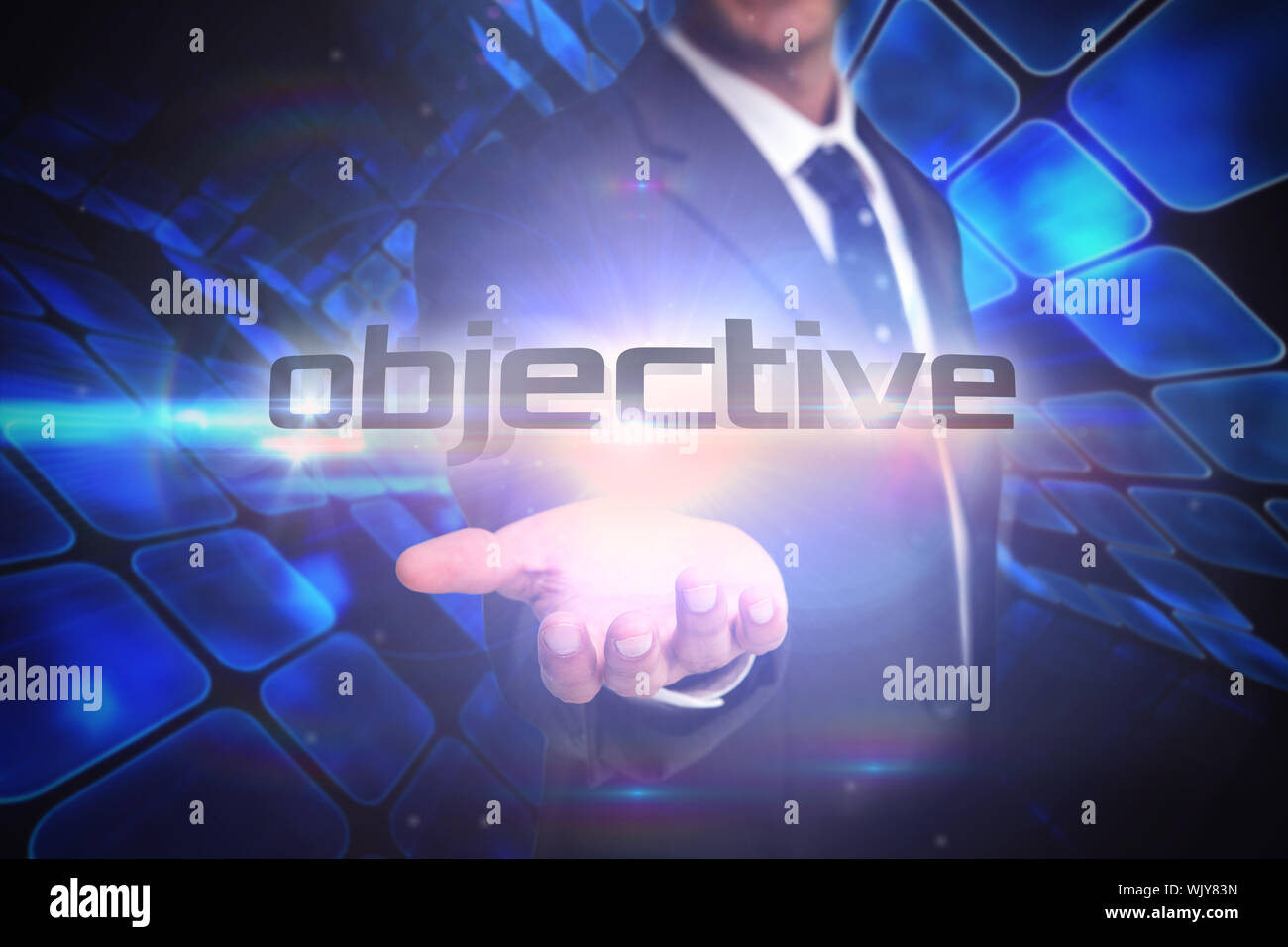 The word objective and businessman presenting against room of shiny ...