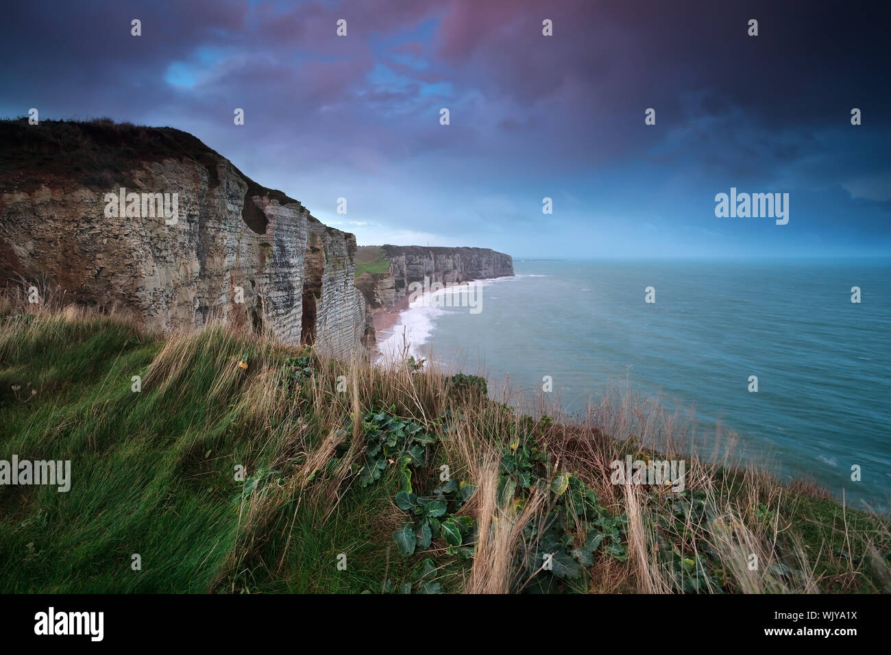 sunrise over cliff in ocean, Etretat, Normandy, France Stock Photo - Alamy