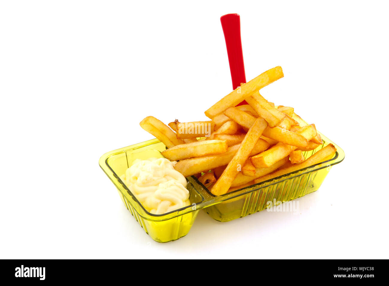 Portion French fries with mayonnaise and little plastic fork Stock ...