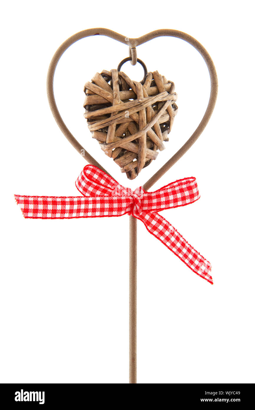 Natural decoration heart made from branches with ribbon Stock Photo - Alamy