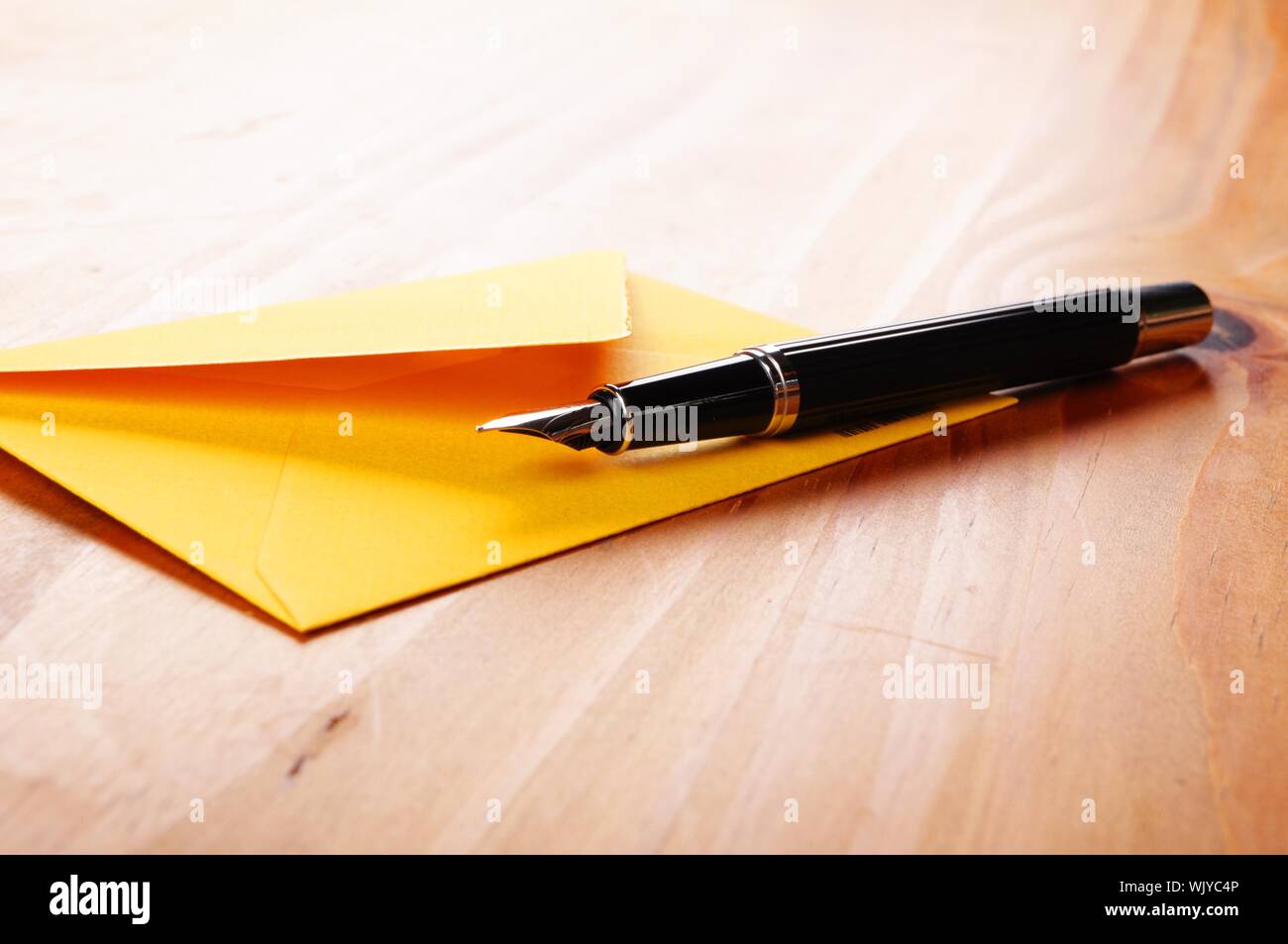 envelop and pen showing mail or communication concept Stock Photo - Alamy