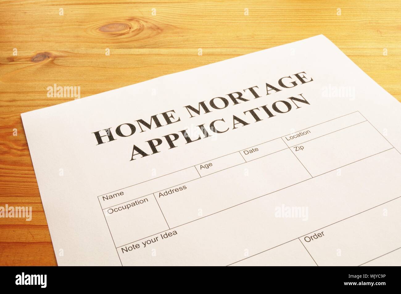 home mortage application form on desktop in office showing real estate ...