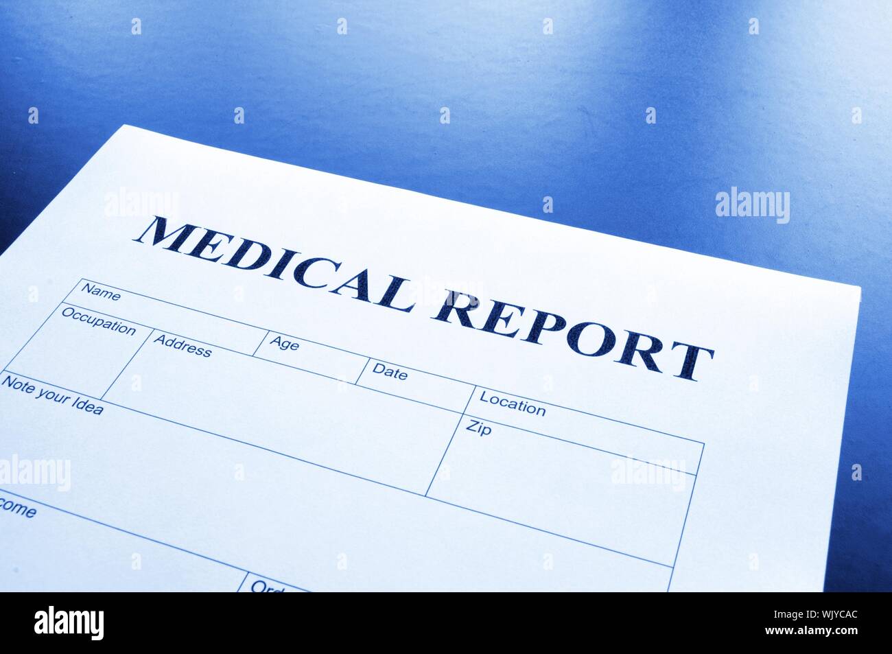 medical report form in doctors hospital office showing health concept ...
