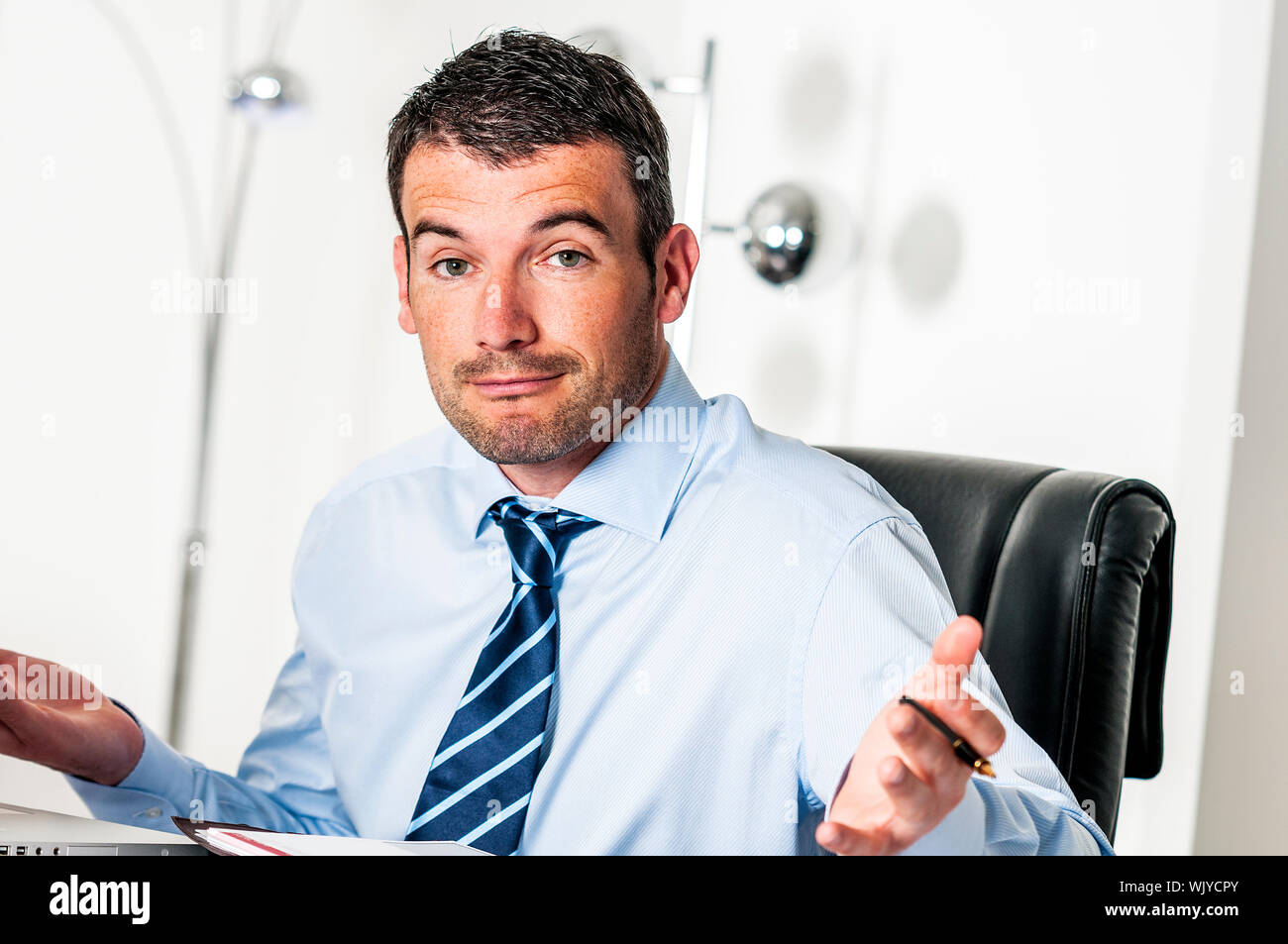 Hidden behind paperwork hi-res stock photography and images - Alamy