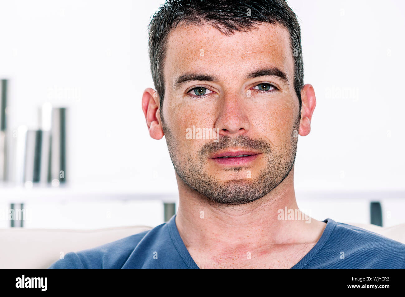 natural and relaxed looking young man Stock Photo - Alamy