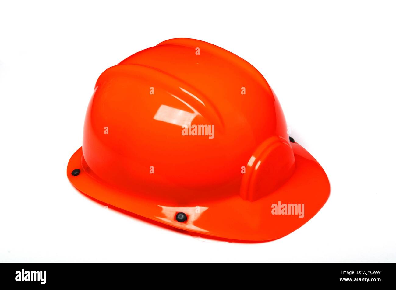 hard hat or construction helmet showing safety work concept Stock Photo ...