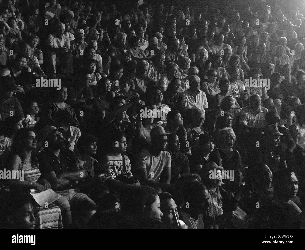 Large crowd sitting hi-res stock photography and images - Alamy