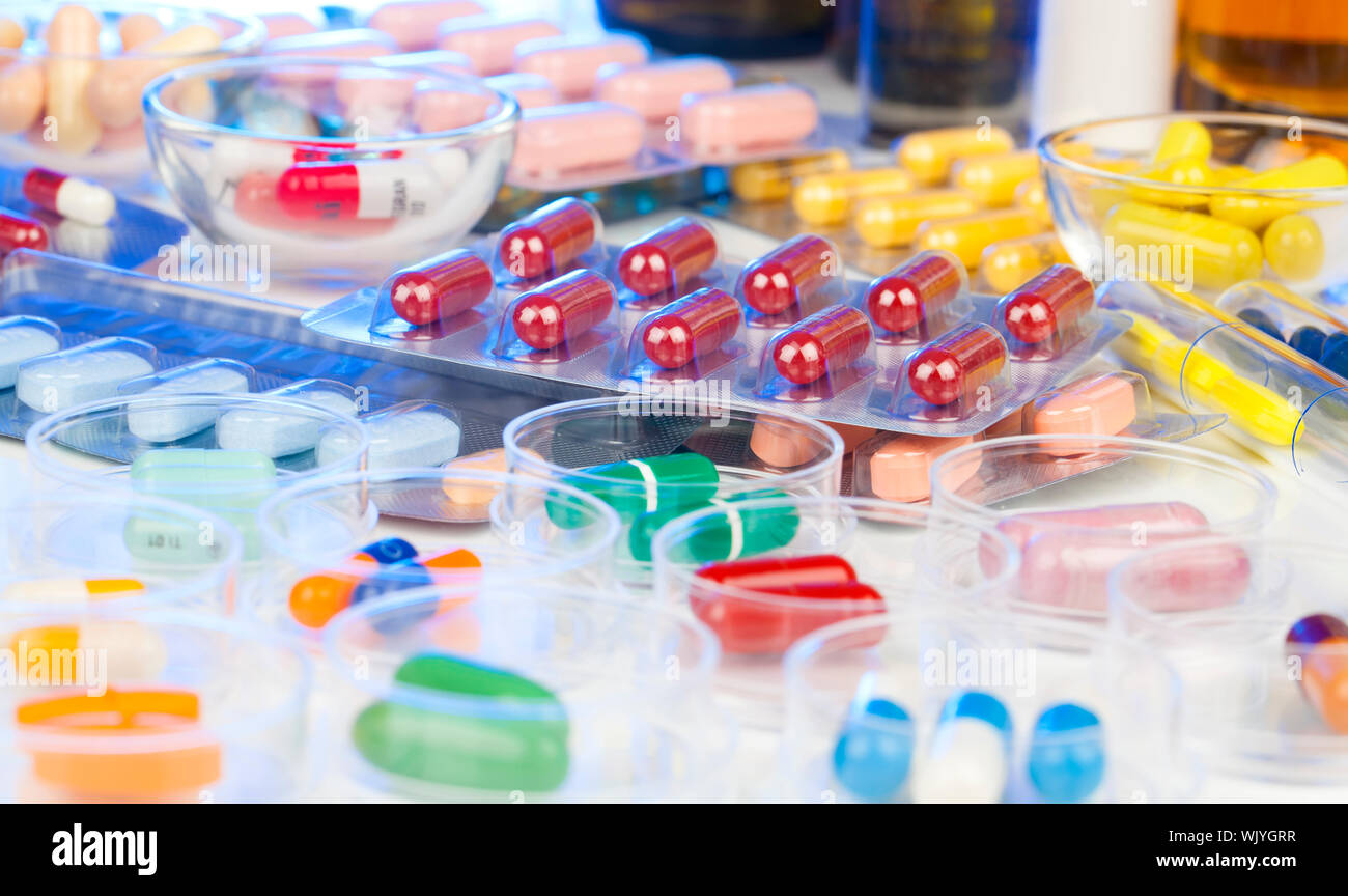 pile of many different pills Stock Photo - Alamy