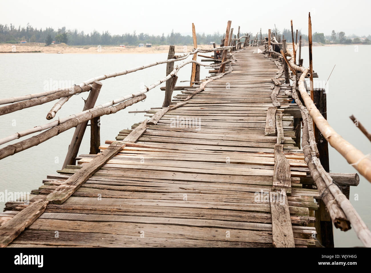 Unstable rickety bridge in Vietnam Stock Photo - Alamy