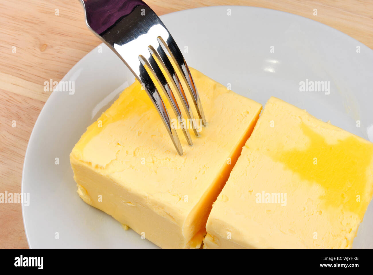 prepare some organic butter to bake a cake Stock Photo - Alamy