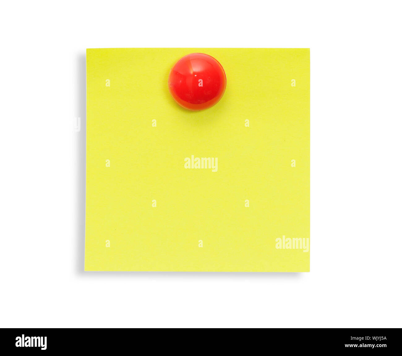 Yellow reminder note with red pin isolated on the white background ...