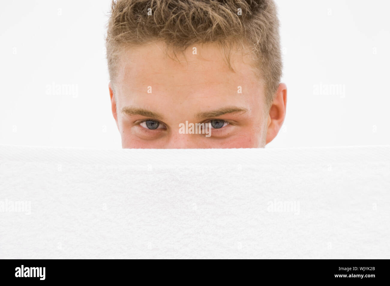 Man towel hiding hi-res stock photography and images - Alamy