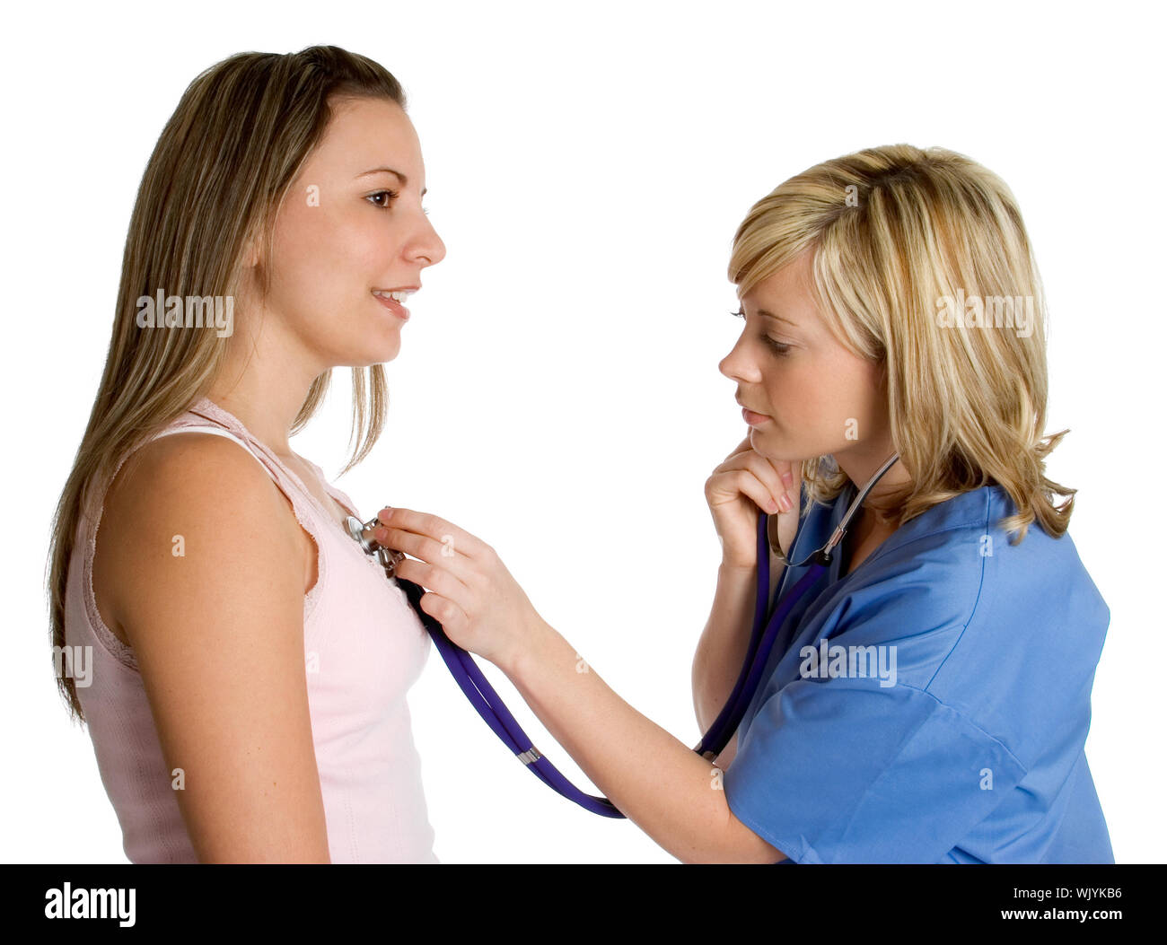 Nurse using stethoscope on patient Stock Photo - Alamy