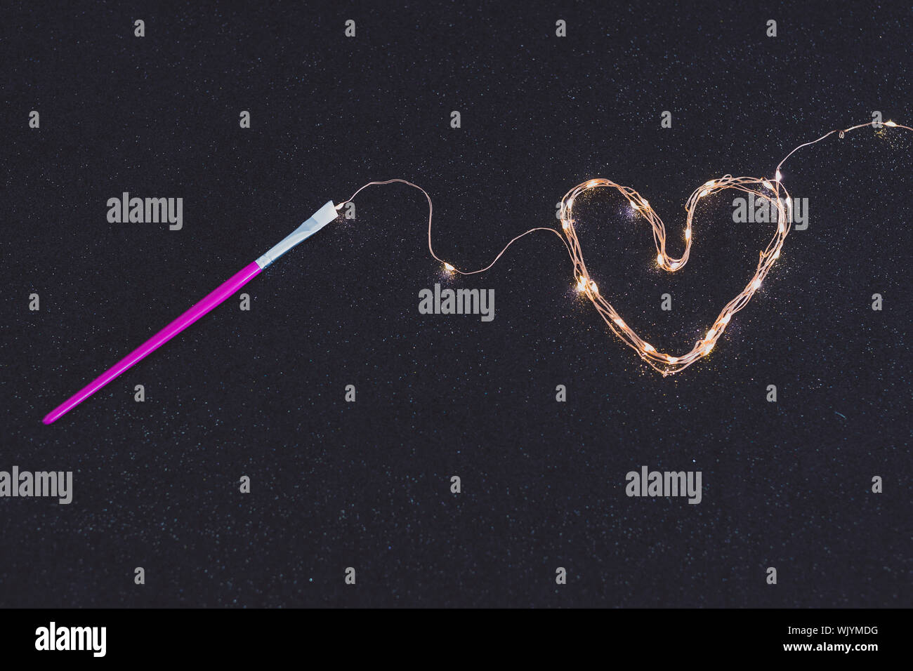paintbrush painting with light with a set of string led lights, surreal ...