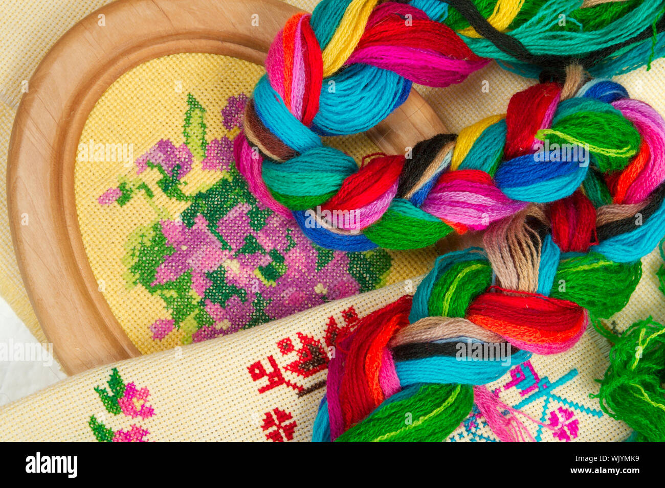 Violet flower embroidered with silk threads Stock Photo - Alamy