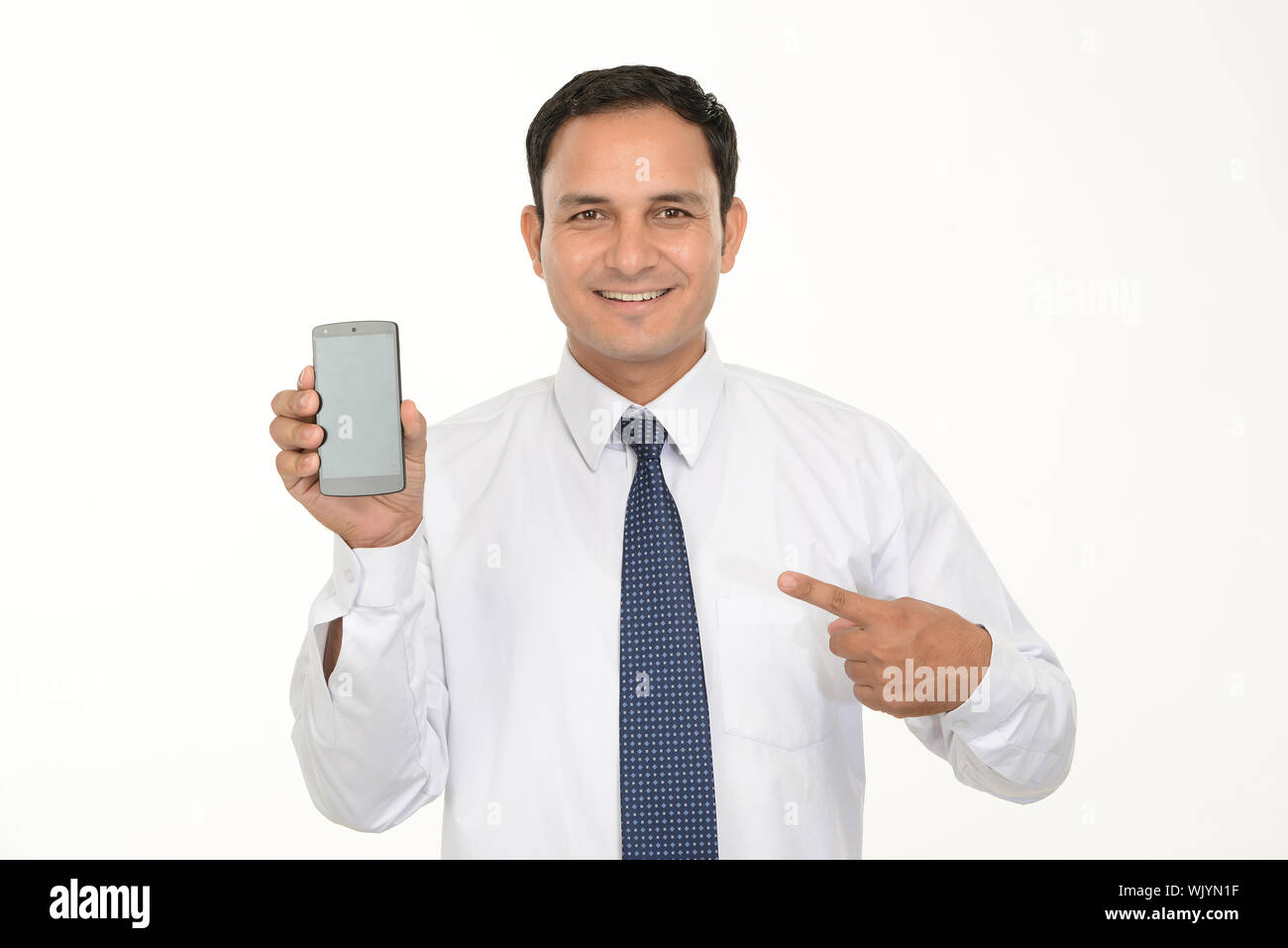 Salesman showing a smart phone Stock Photo - Alamy