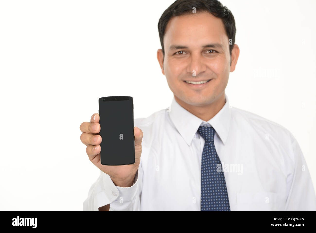 Salesman showing a smart phone Stock Photo - Alamy