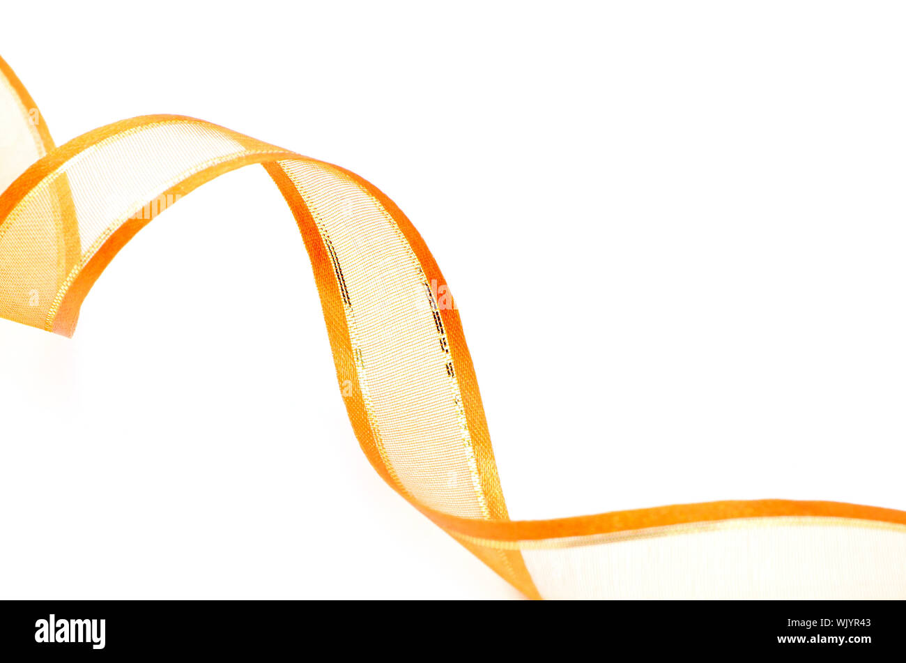 Beautiful orange gift ribbon on a white background Stock Photo - Alamy