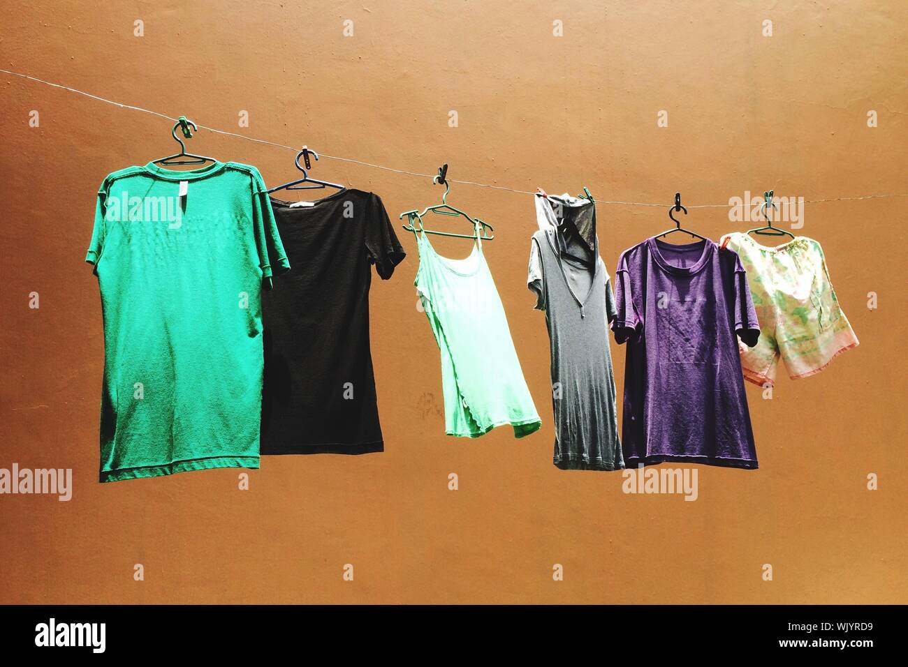 Clothesline rack hi-res stock photography and images - Alamy