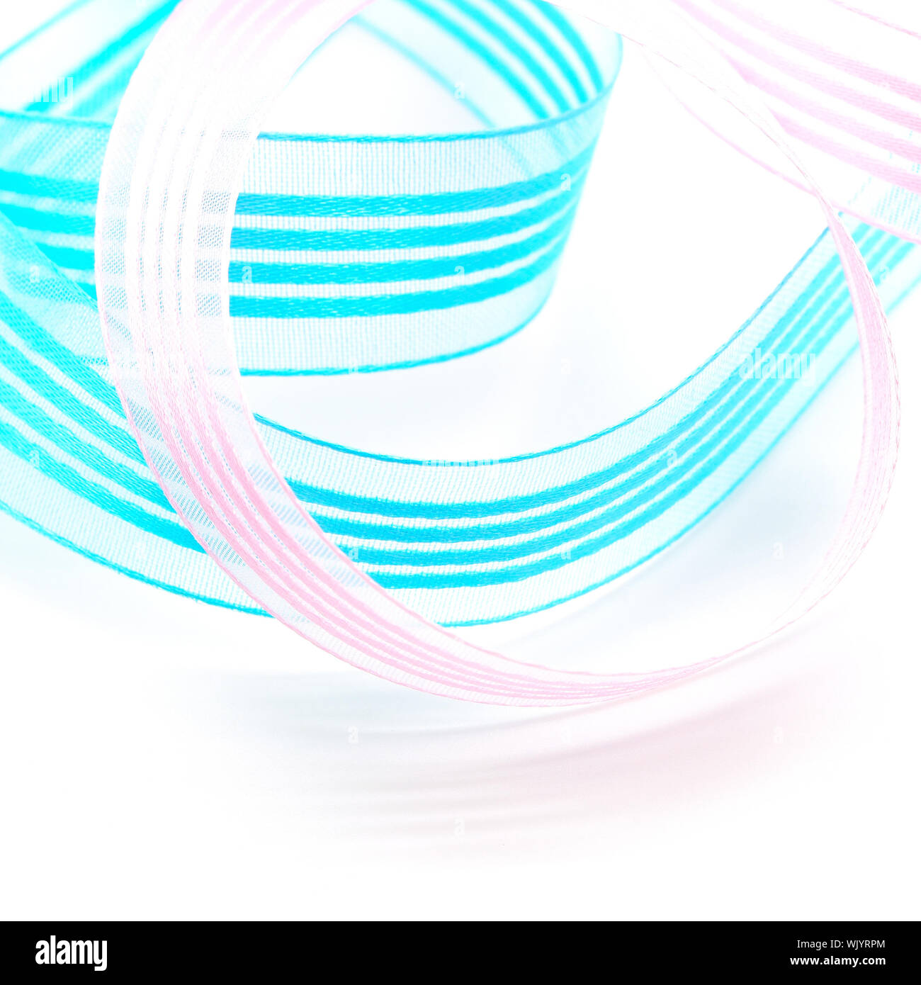 Blue and pink ribbon, isolated on a white background Stock Photo - Alamy