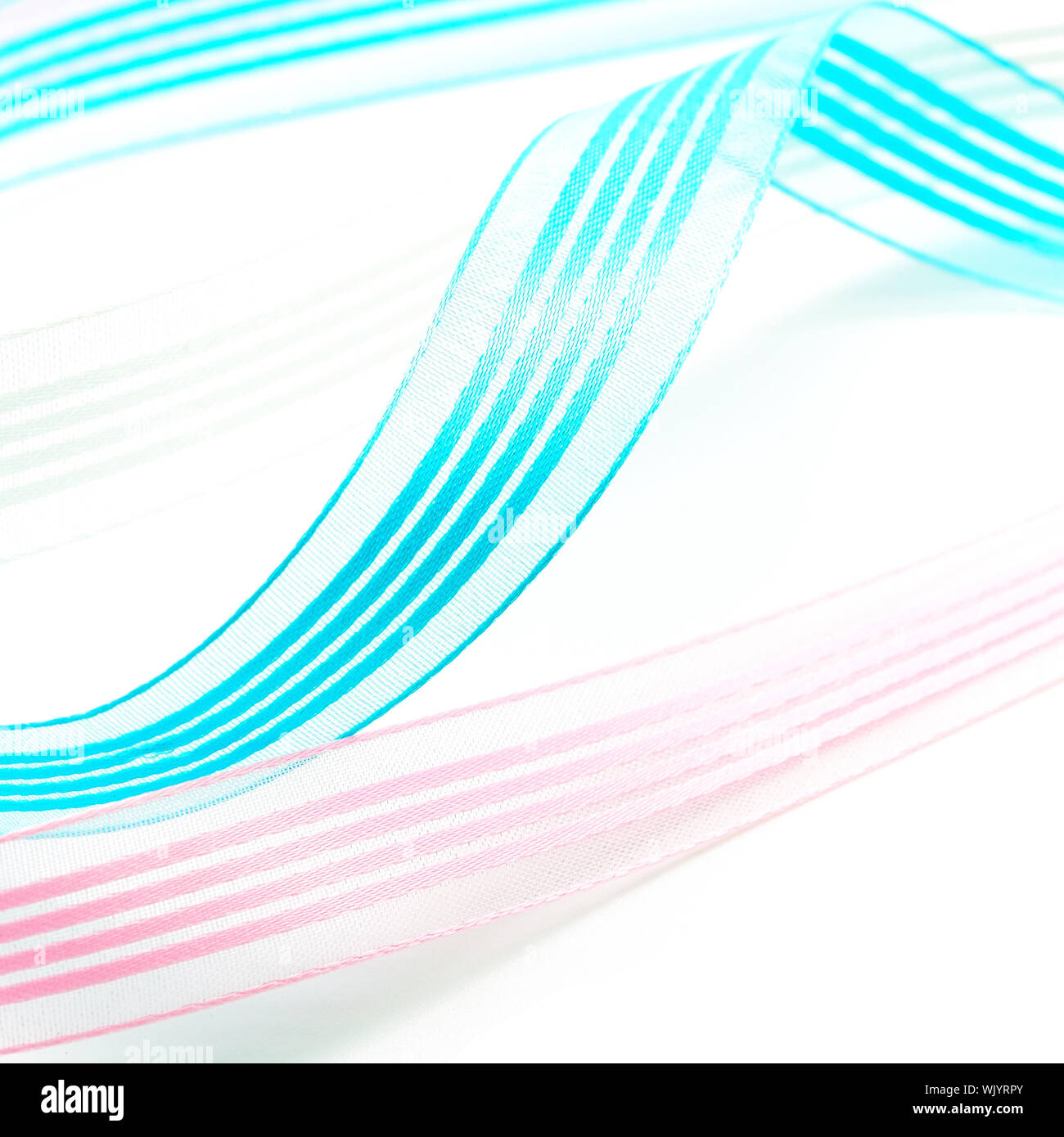 Blue and pink ribbon, isolated on a white background Stock Photo - Alamy