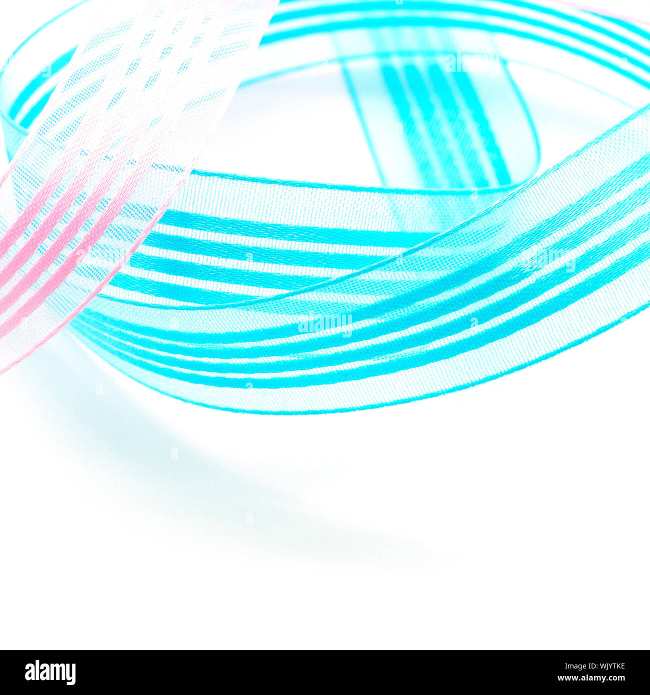 Blue and pink ribbon, isolated on a white background Stock Photo - Alamy