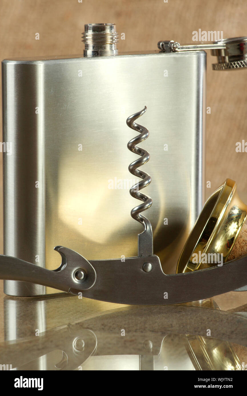 Small metal flask for carrying alcohol Stock Photo - Alamy