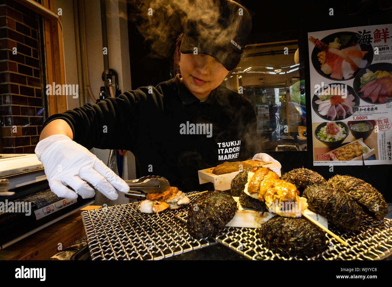 Japanese woman cooking hi-res stock photography and images - Alamy