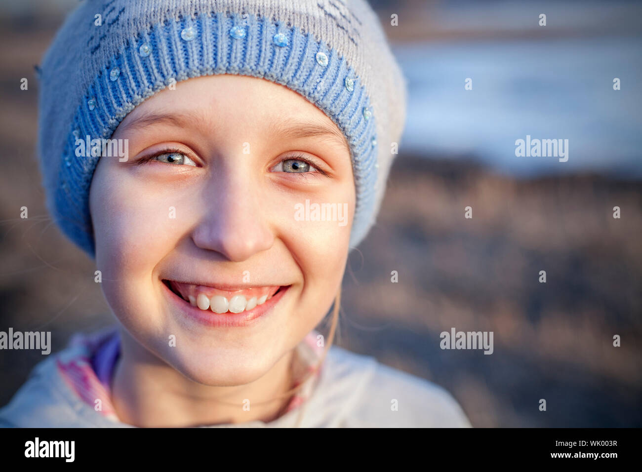 Outdoor portrait of a cute little girl on a chilly day Stock Photo - Alamy