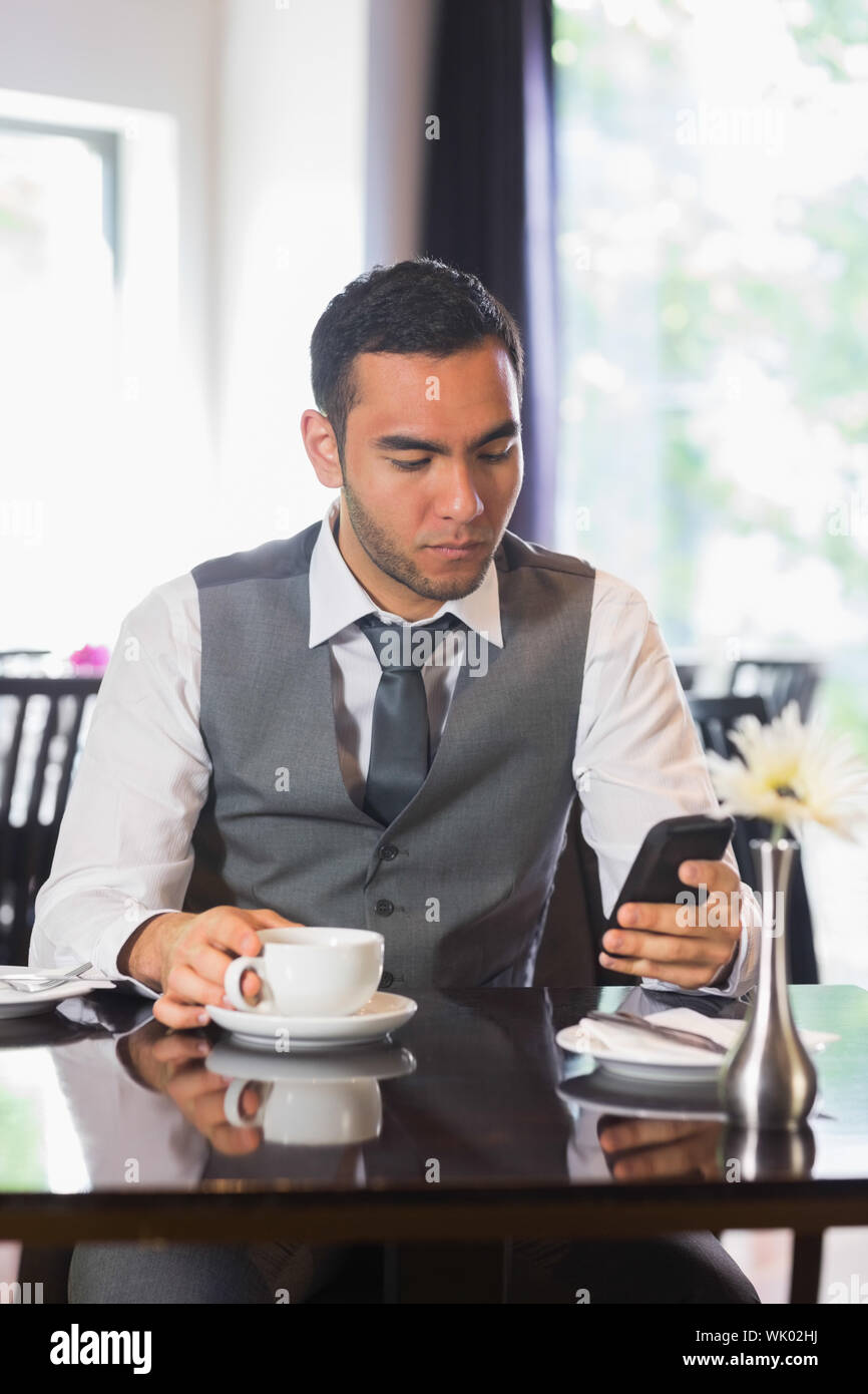 Smart man suit restaurant table hi-res stock photography and images - Alamy